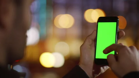 Guy hand scrolling phone green screen ou... | Stock Video | Pond5