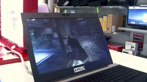 Guy is playing video game batman | Stock Video | Pond5