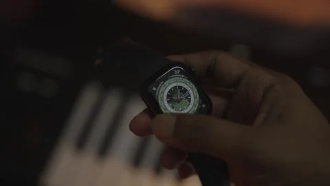 A guy scrolling through watch faces on a... | Stock Video | Pond5
