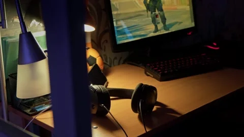 Guy sitting at the computer at night, dr... | Stock Video | Pond5