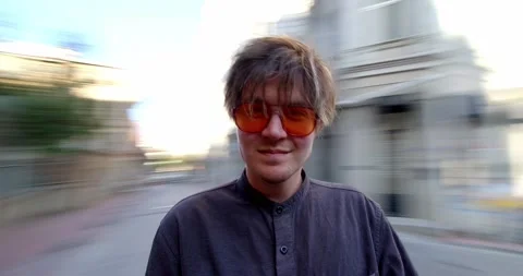 The guy spinning around in the middle of... | Stock Video | Pond5