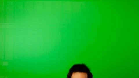 guy using mobile / tablet with green scr... | Stock Video | Pond5