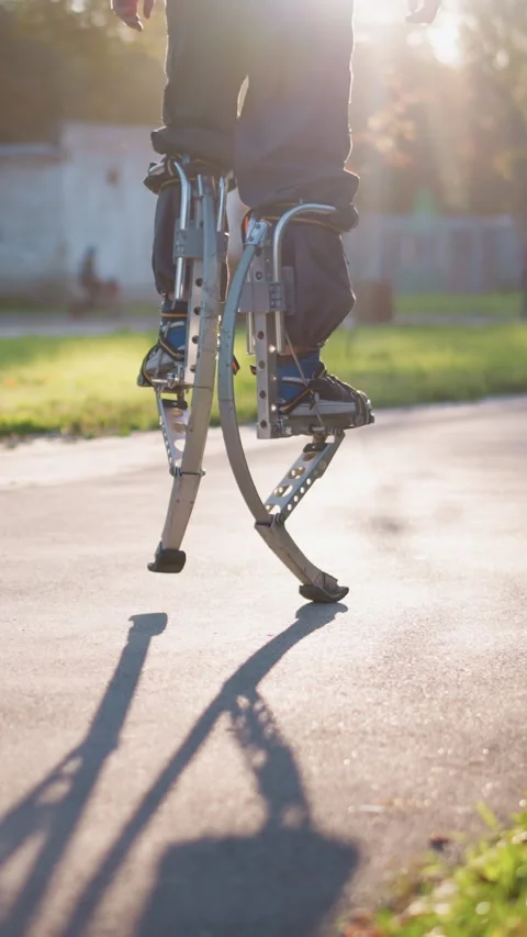 Guy Walking on Spring-Loaded Prosthetic ... | Stock Video | Pond5