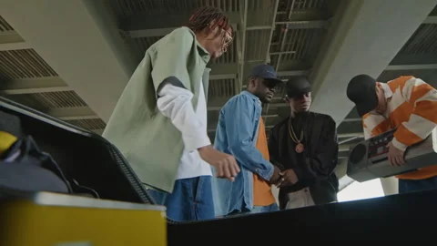 Guys Listening to Hip Hop Music on Vinta... | Stock Video | Pond5