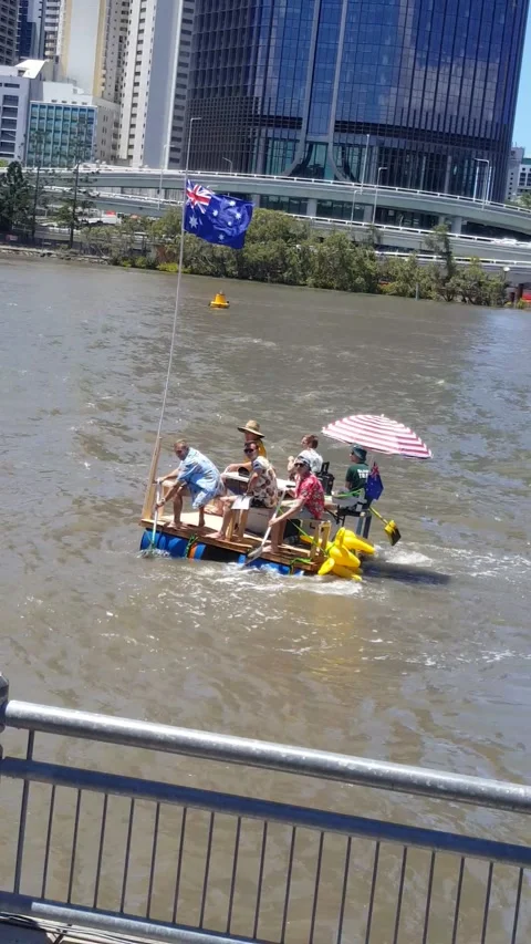 Guys Make Homemade Raft to Celebrate Aus... | Stock Video | Pond5