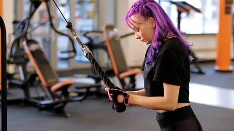 gym workout fit woman bright hair tricep... | Stock Video | Pond5