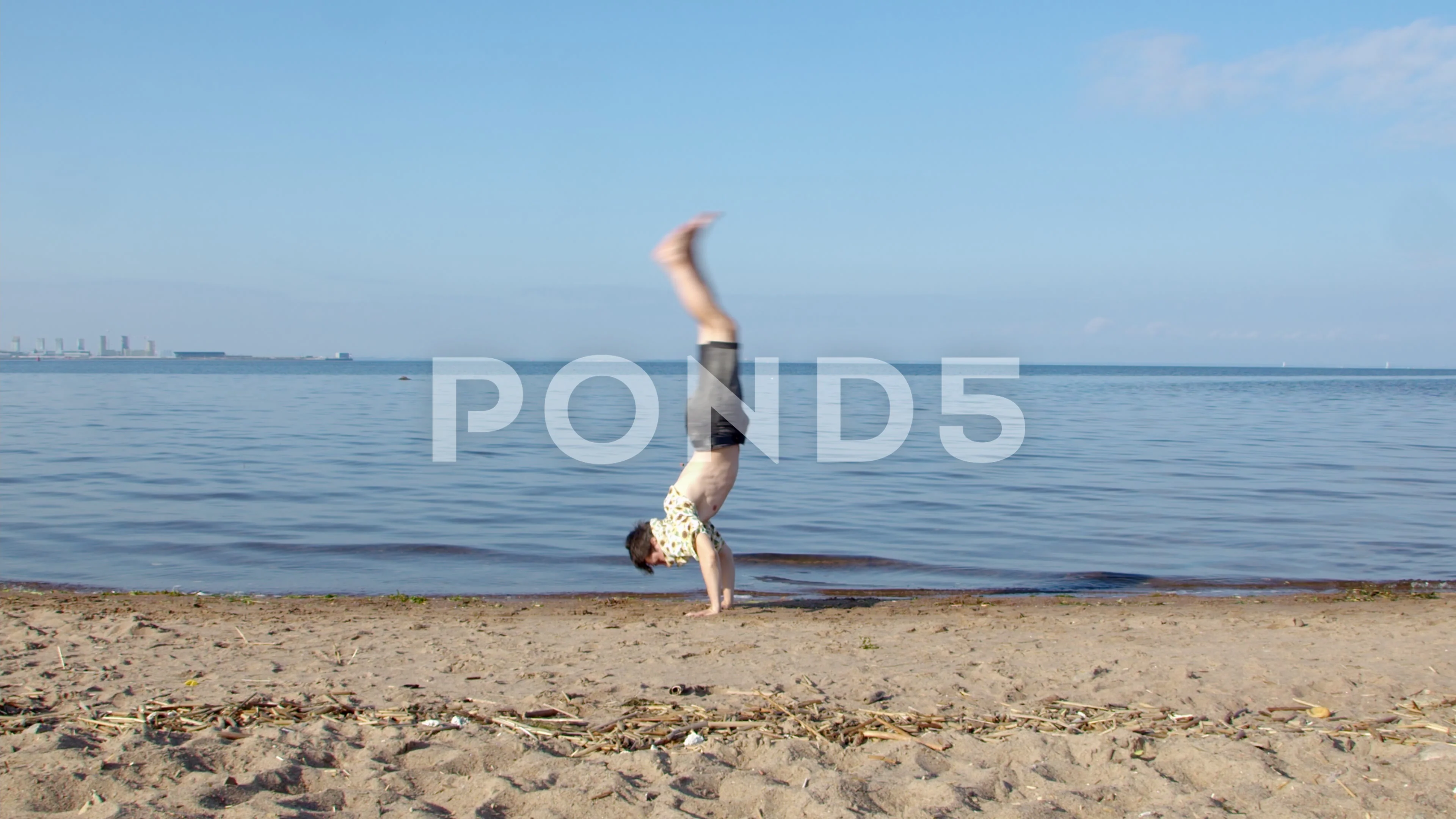 Back Handspring On Beach