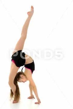 Photograph: Gymnast Girl Doing Vertical Splits Holding her Leg up with ...