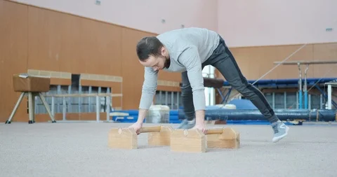 Gymnast performing planche push ups and ... | Stock Video | Pond5