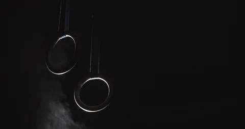 Gymnastic Olympic Rings on black backgro... | Stock Video | Pond5