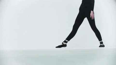 Gymnastics - young woman sits down in a ... | Stock Video | Pond5