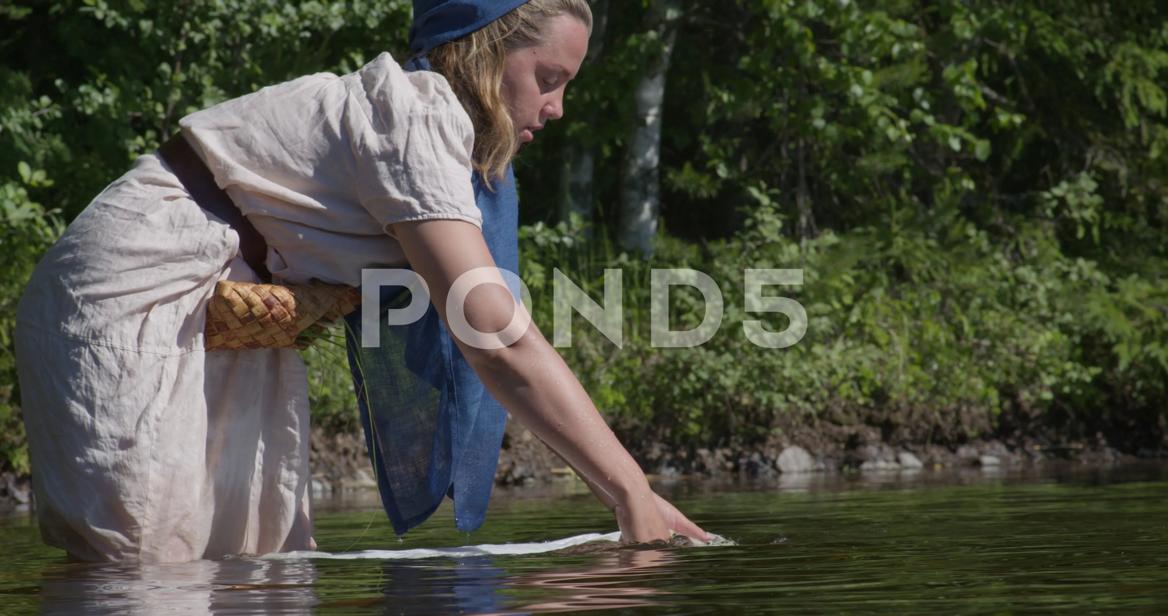 Washing Clothes In River