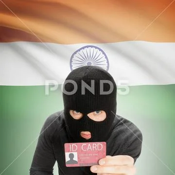 Hacker with flag on background holding ID card in hand - India Hacker ...
