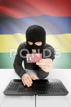 Photograph: Hacker with ID card in hand and flag on background ...