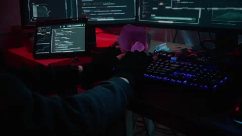 Hacker stretching arms and continue typi... | Stock Video | Pond5
