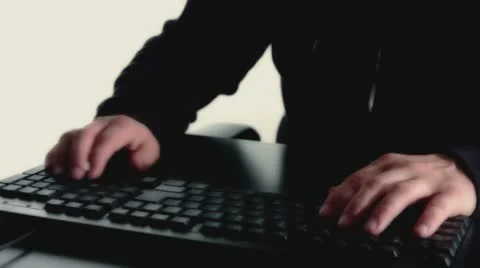 Hacker typing on black keyboard 4k | Stock Video | Pond5