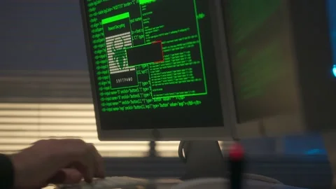 Hacker is typing on a computer keyboard.... | Stock Video | Pond5