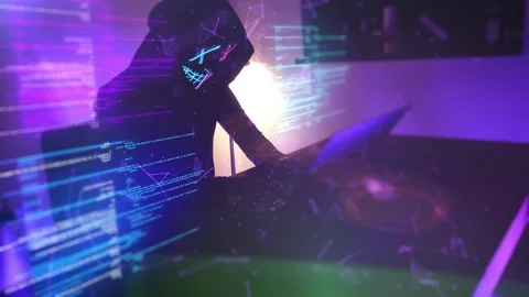 hacker wearing a glowing mask sitting in... | Stock Video | Pond5