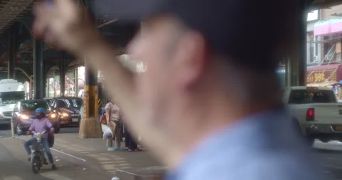 Hailing a City Bus Under The Elevated Su... | Stock Video | Pond5