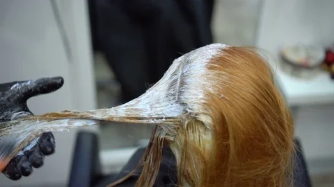 hair coloring beauty studio, applying ha... | Stock Video | Pond5