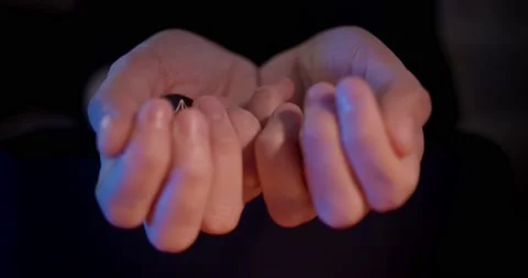 Halloween Candy Falling On Hands | Stock Video | Pond5