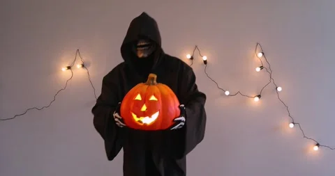 Halloween Death man dancing with jack o ... | Stock Video | Pond5