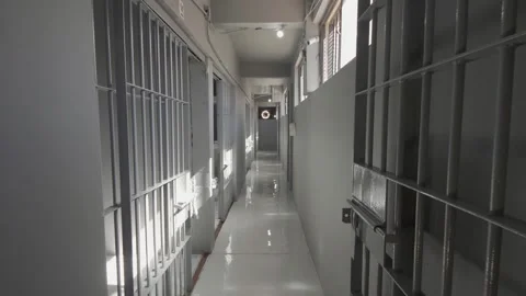 Hallway full of empty Prison jail cells | Stock Video | Pond5