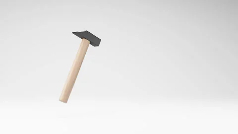 Hammer Spinning on Studio Light Gray Bac... | Stock Video | Pond5