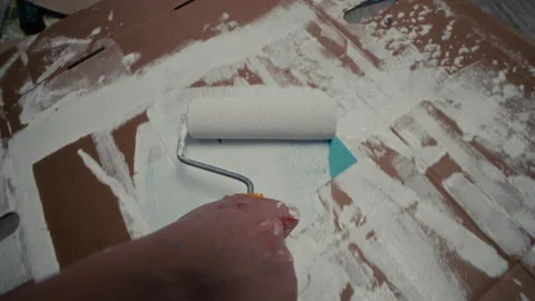 Hand Applying White Paint on Cardboard S... | Stock Video | Pond5