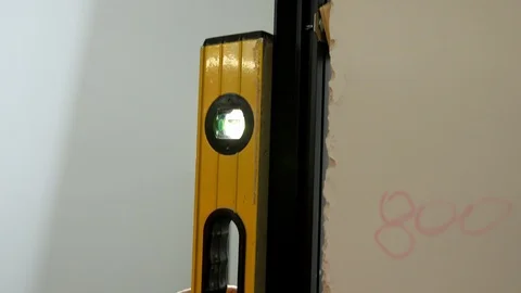 in the hand of bubble level ruler Clinom... | Stock Video | Pond5