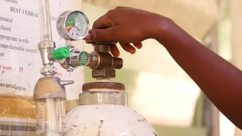 Hand checking the oxygen level of an oxy... | Stock Video | Pond5