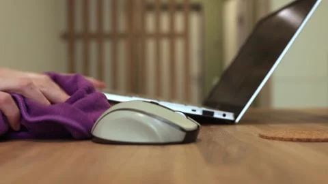 Hand cleaning work desk. Wiping dust fro... | Stock Video | Pond5