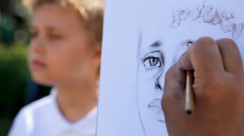 Hand Drawing a Boy Face with Pencil outd... | Stock Video | Pond5