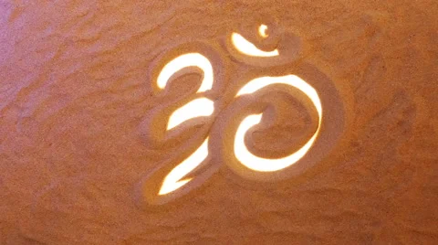Hand drawing Om Symbol in the sand. Beac... | Stock Video | Pond5