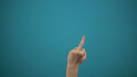 Hand gives middle finger on blue backgro... | Stock Video | Pond5