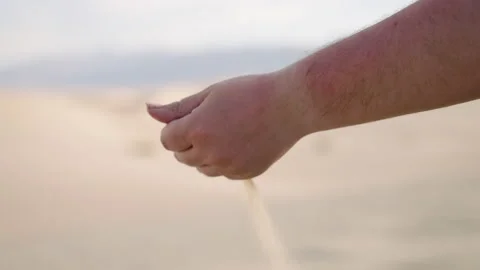 Hand Grabbing Sand On Sand Dunes In Deat... | Stock Video | Pond5