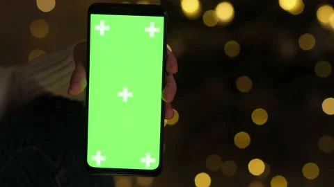 Hand holding Chroma Key Green Screen in ... | Stock Video | Pond5