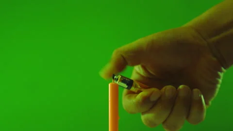 Hand holding lighter to lighting the can... | Stock Video | Pond5