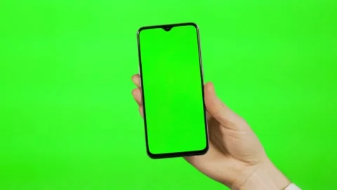The Hand Holds Vertically A Cell Phone w... | Stock Video | Pond5