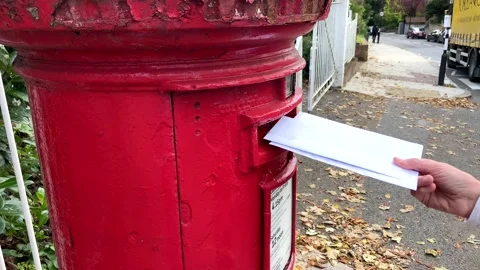 Hand mailing post in red British letter ... | Stock Video | Pond5