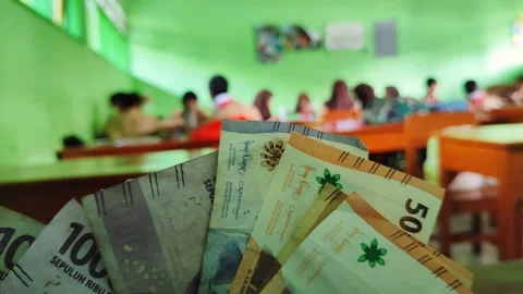 The hand of a man holding a group of rup... | Stock Video | Pond5