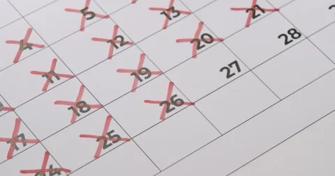 Hand Marking Calendar Dates with Red Cro... | Stock Video | Pond5