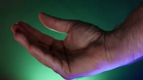 hand of middle-aged man at green backgro... | Stock Video | Pond5