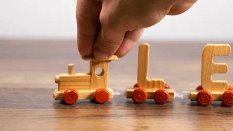 Hand moving toy train, child boy playing... | Stock Video | Pond5