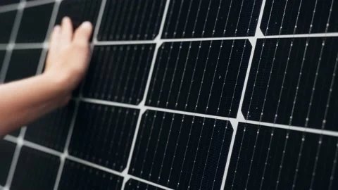 Hand of person touching solar panel. Ren... | Stock Video | Pond5