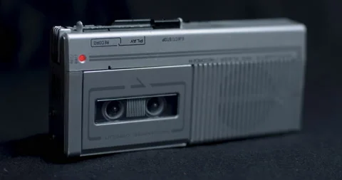 Hand Picking Up Microcassette Recorder A... | Stock Video | Pond5