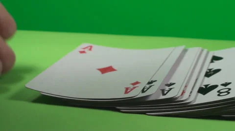 Hand Picking Up Playing Cards On A Green... | Stock Video | Pond5