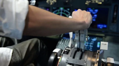 Hand of pilot push thrust lever handle f... | Stock Video | Pond5
