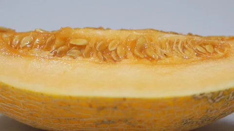 Hand Placing Melon Slice On White Table,... | Stock Video | Pond5
