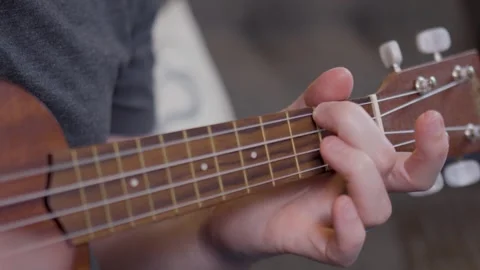 Hand Playing Ukulele Chords 4K | Stock Video | Pond5